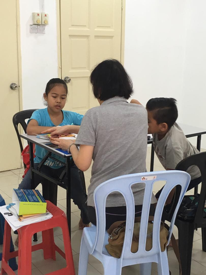 Volunteer to read with a child at Kerinchi Literacy Hub - Missions ...