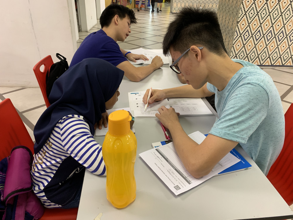 Volunteer to read with a child at Kerinchi Literacy Hub - Missions ...