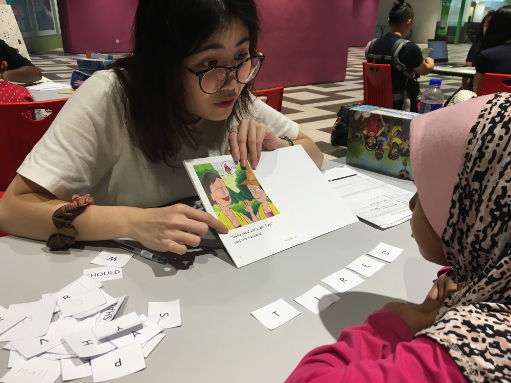 Volunteer to read with a child at Kerinchi Literacy Hub - Missions ...